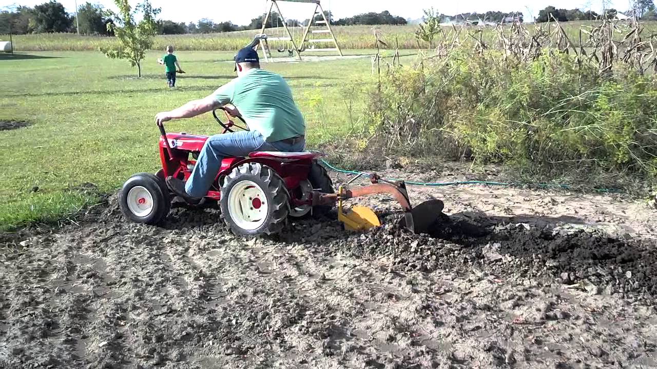 Wheel Horse suburban 401 plowing - YouTube