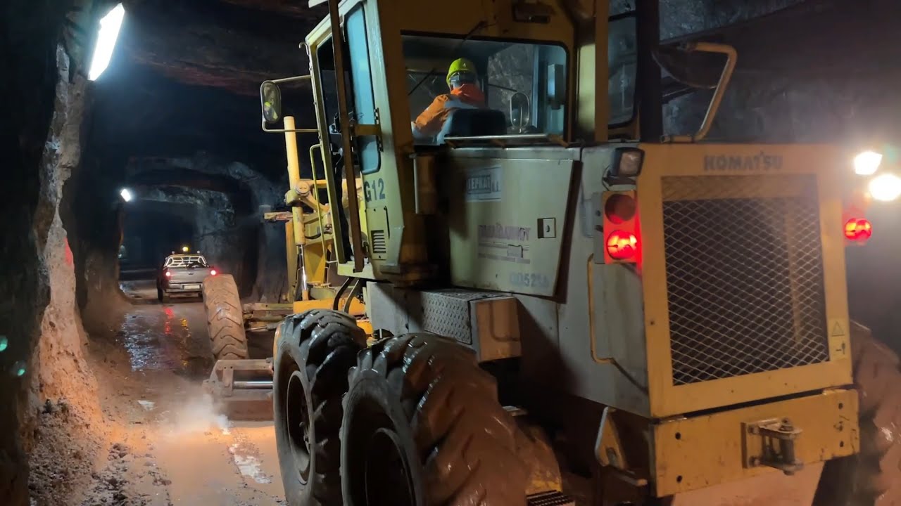 Komatsu GD521A Grader Cleaning The Main Roads Of Underground Bauxite ...