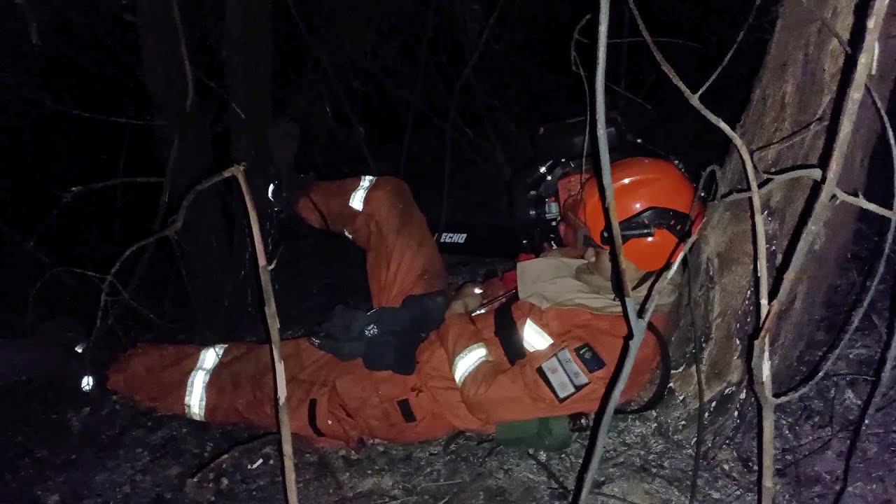 Chinese firefighters take nap at scene of fire - YouTube
