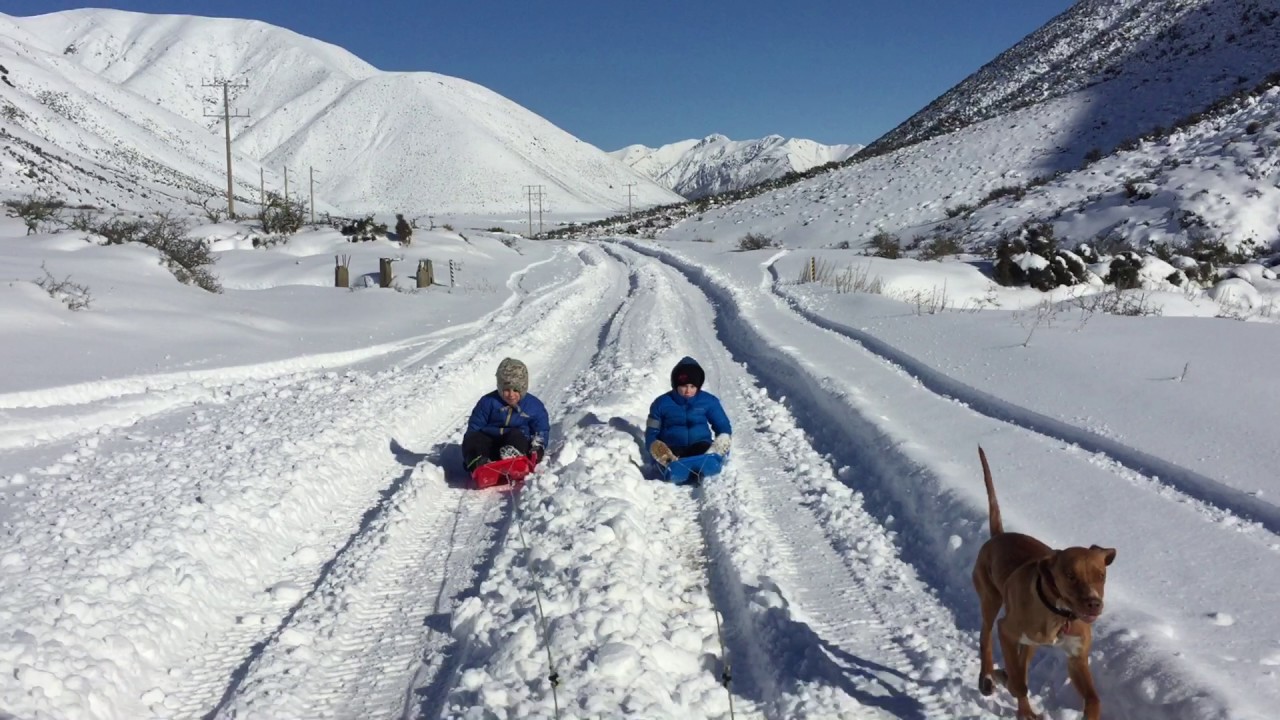 Sledding behind a truck - YouTube