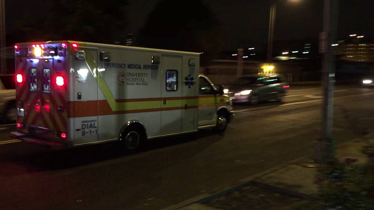 UNIVERSITY HOSPITAL EMS AMBULANCE RESPONDING ON BERGEN STREET IN NEWARK ...