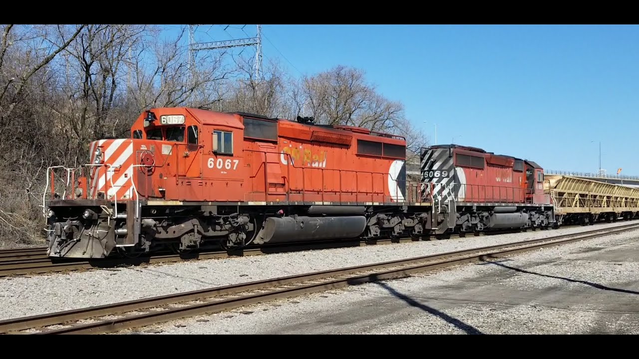 cp 6067 and 6069 shove a ballast train into muskego yard - YouTube