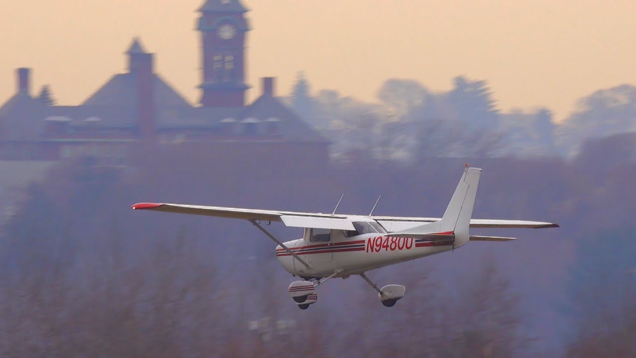 Plane spotting a Cessna 150 final approach and landing [4K Video ...