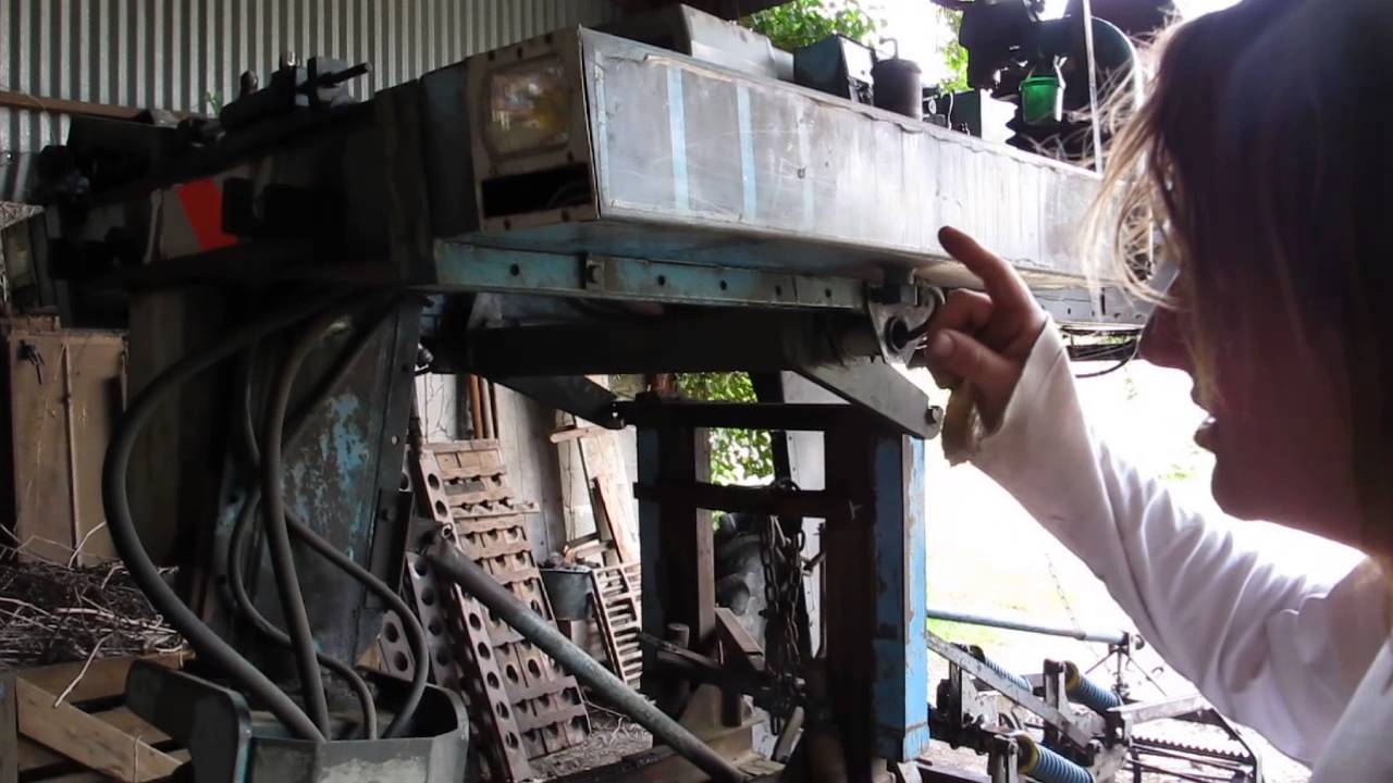 Custom-modified straddle tractor - YouTube