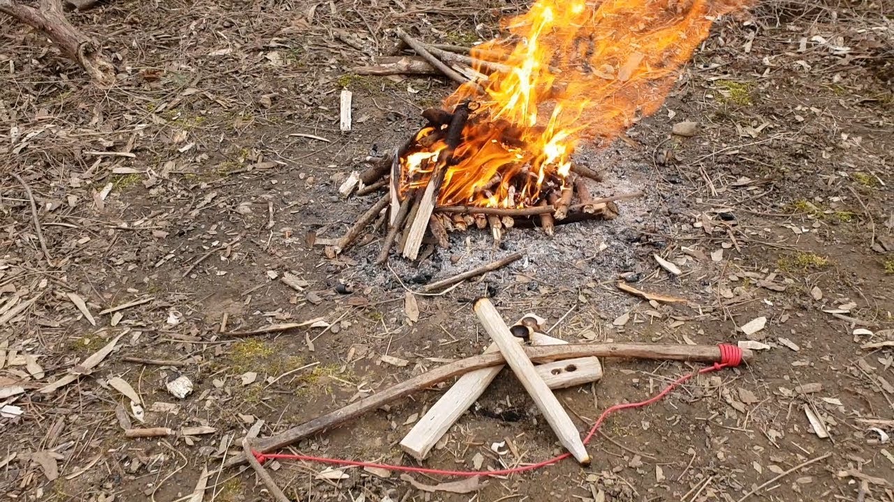Bow Drill Fire on hard wood - Producing Ember and Getting Flames - YouTube