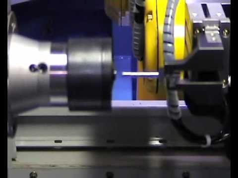 Robot Insert Loading on ANCA RX7 - YouTube