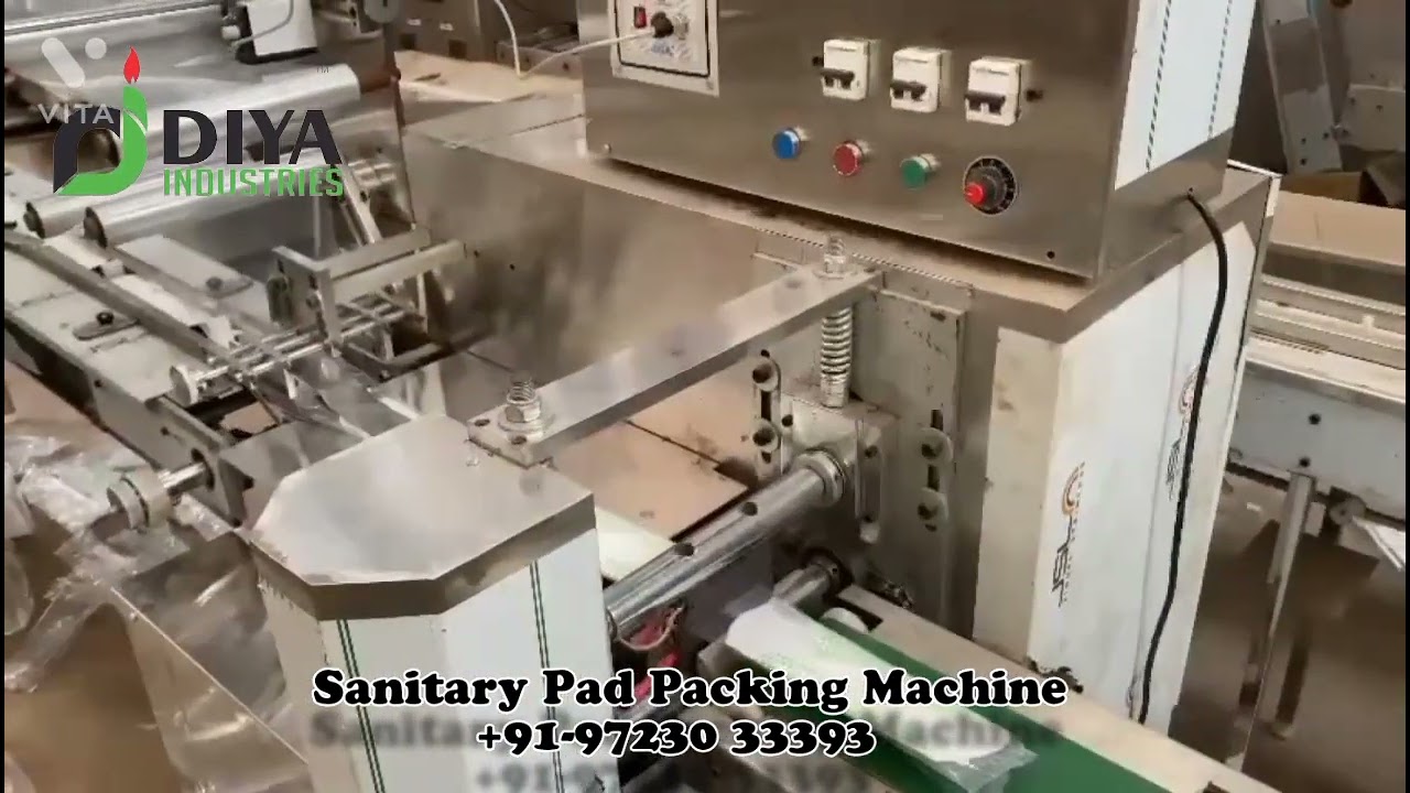 Sanitary Pad Packing Machine - YouTube
