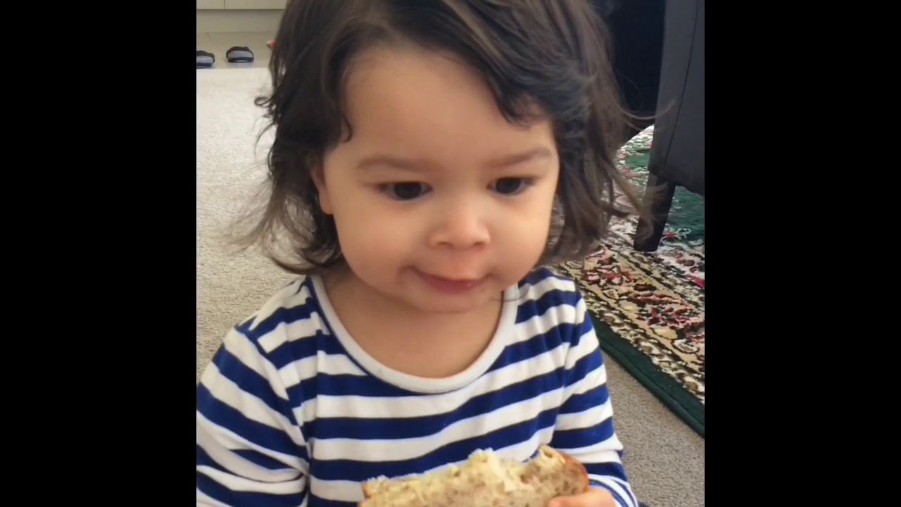 Cute little baby eating Avocado Sandwich for the very first time! - YouTube