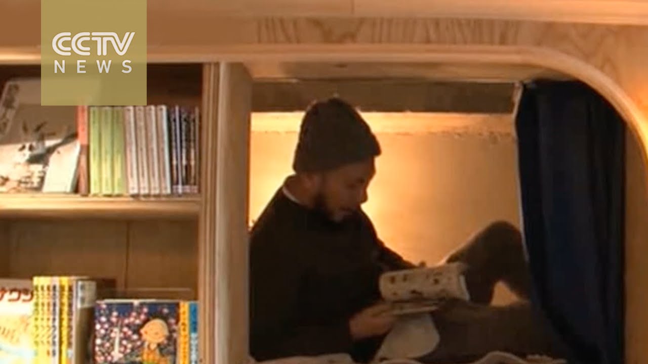 Library-themed Tokyo hotel a book-lover's Paradise - YouTube