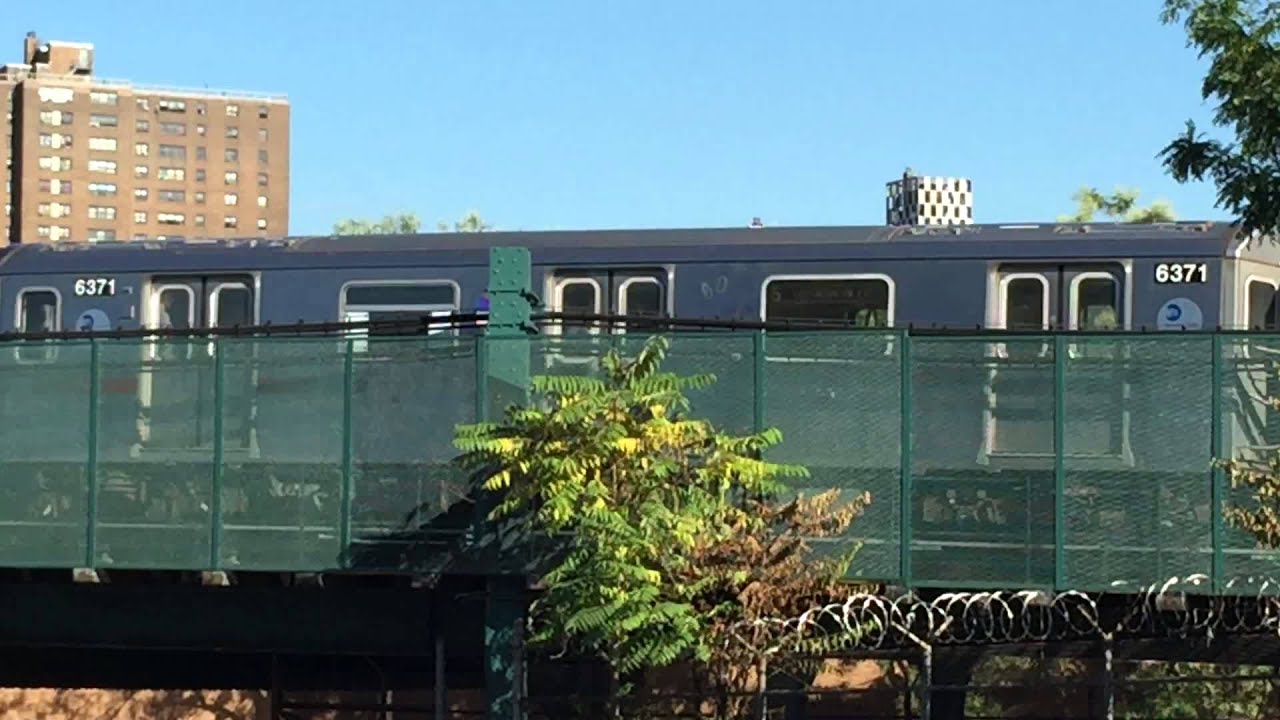 MTA #5 TRAIN DESCENDING INTO 149TH ST. STATION IN THE SOUTH BRONX AREA ...