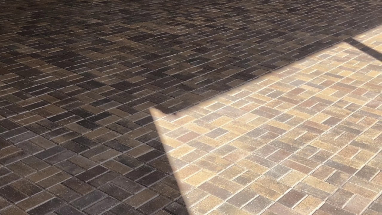 2400 Square Feet of Brick Pavers in a Pole Barn? - YouTube