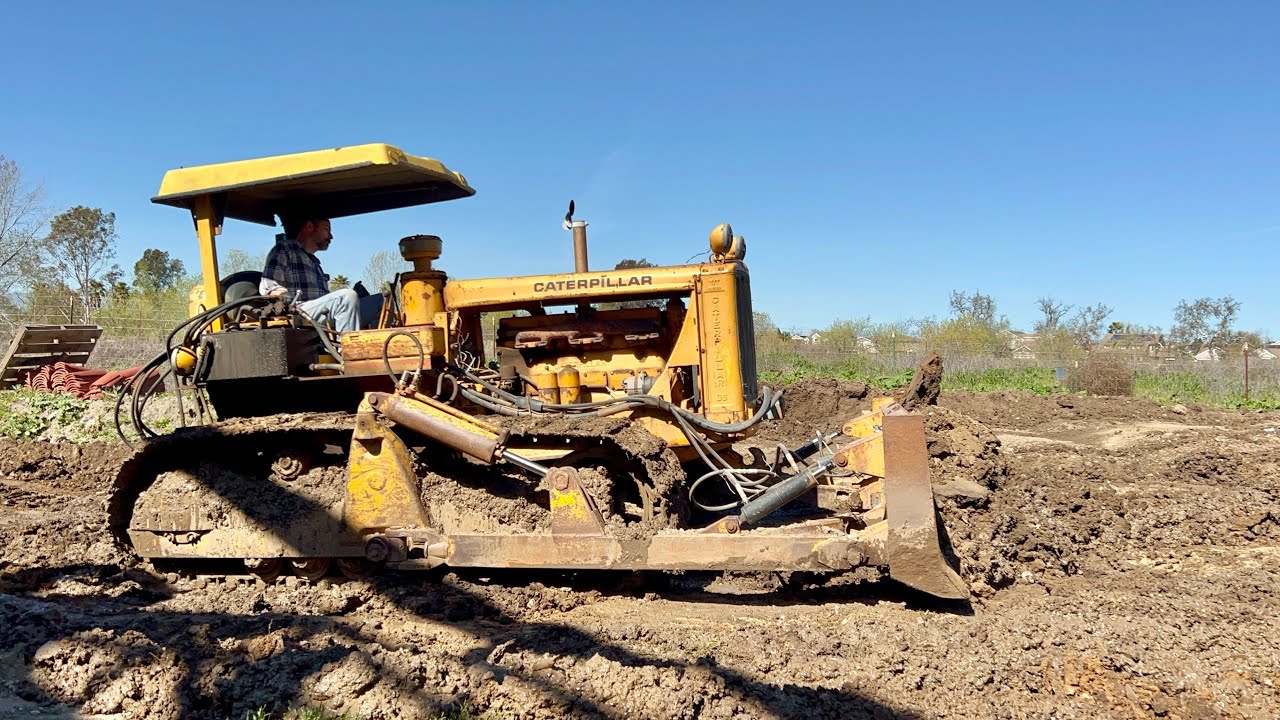 Leveling Dirt with our 1952 D6-9U Caterpillar Bulldozer - YouTube