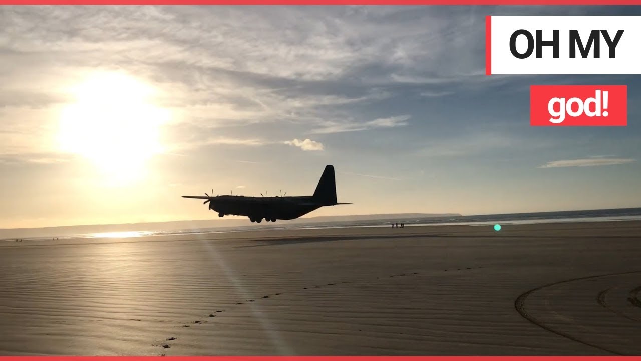 Incredible video shows the moment a Hercules plane lands on a British ...