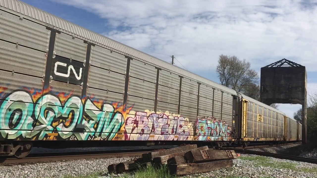 Rerouted Q211 CSX 4571 leading auto racks - YouTube