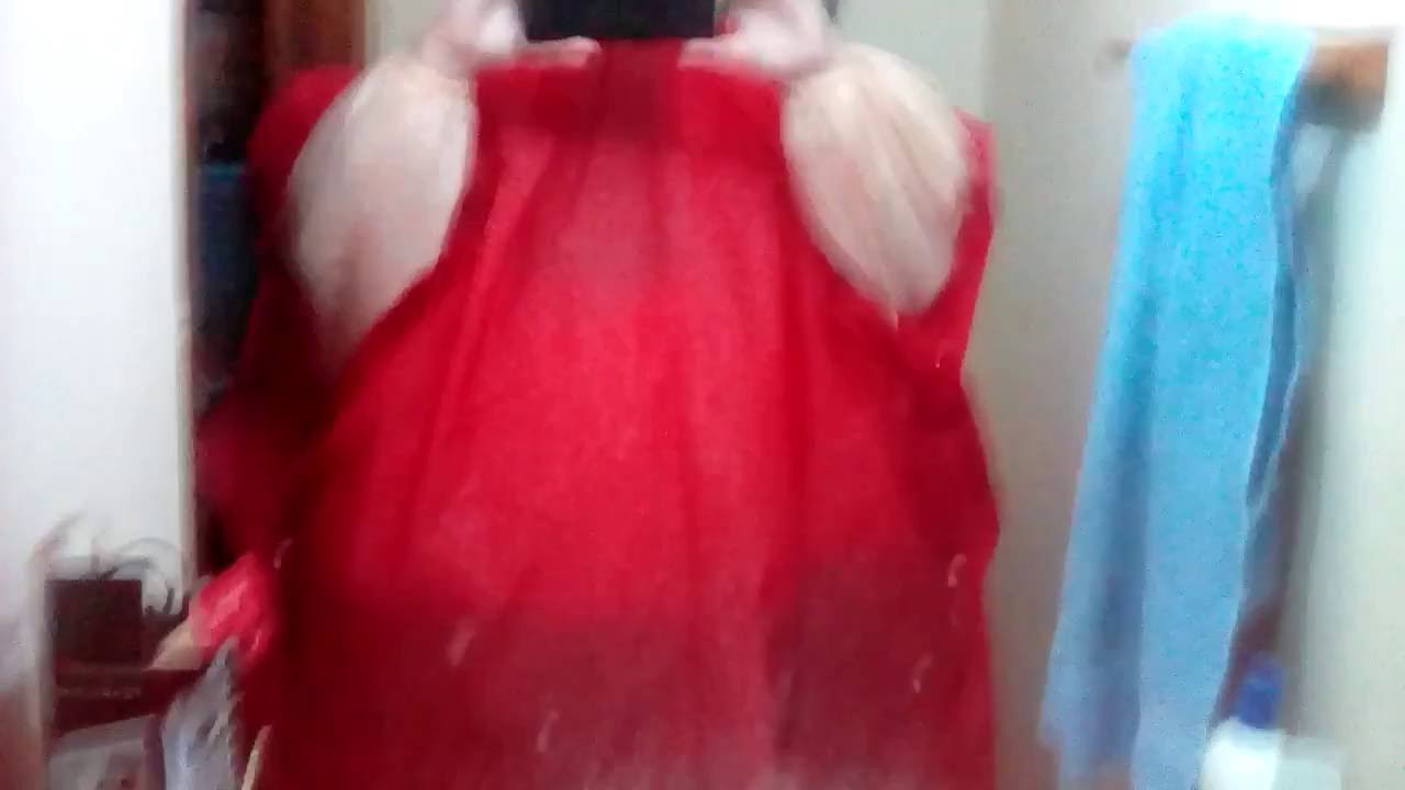 Me in a red rain poncho with inflatable sumo costume under deflating ...