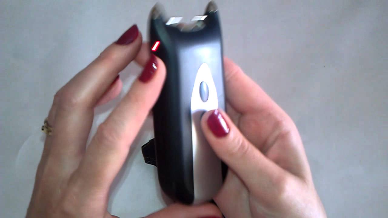 Taser Shocker electrique à piles 1.000.000 volts - YouTube
