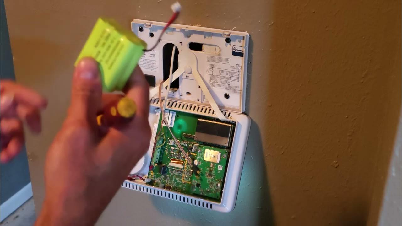 How to change out the back up battery for the 2GIG Go Control Alarm System - YouTube