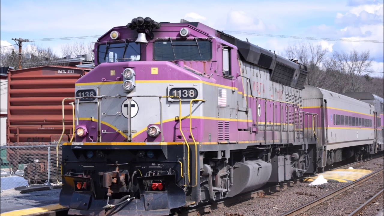 MBTA #1138 Outbound while two Boxcars sit on the adjacent siding - YouTube