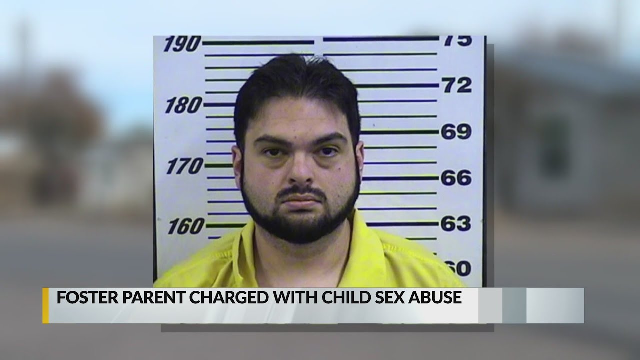Foster parent charged with child sex abuse - YouTube