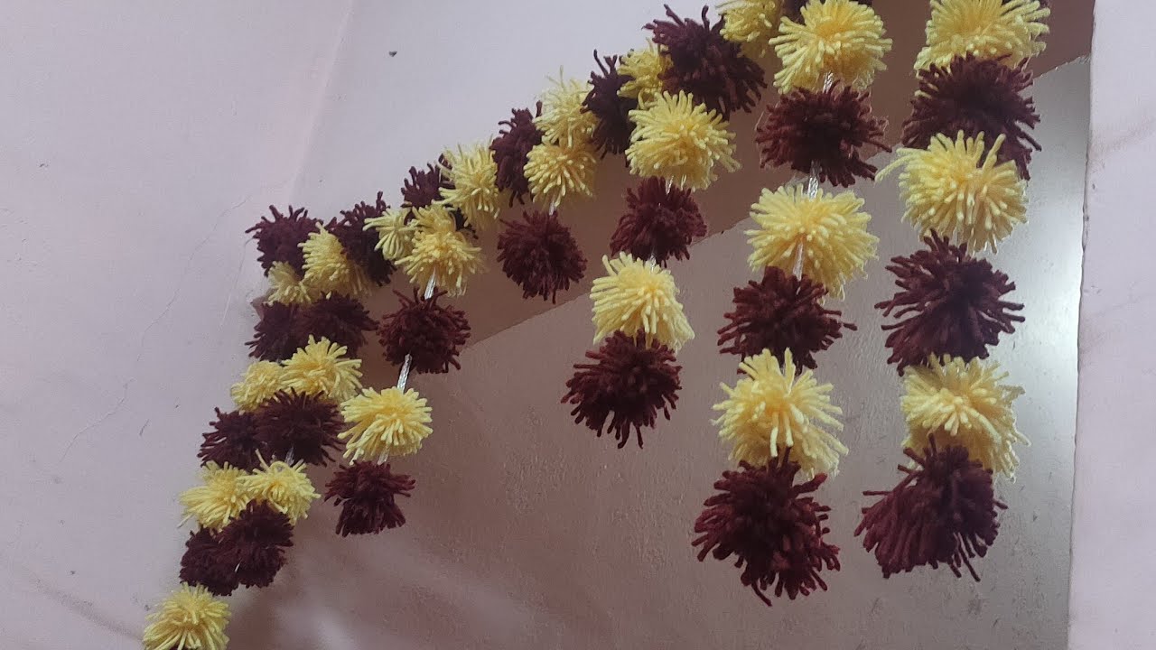 How to make woolen thoranam - easy with woollen thread - YouTube