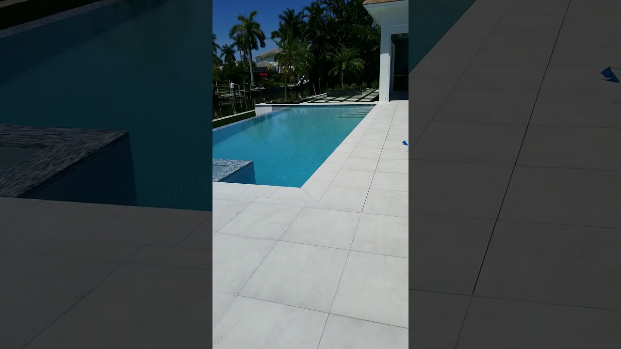 Pool tile installation - YouTube