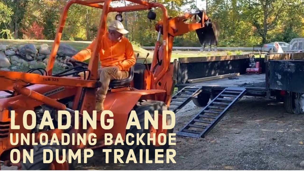 LOADING & UNLOADING BACKHOE on DUMP TRAILER - YouTube