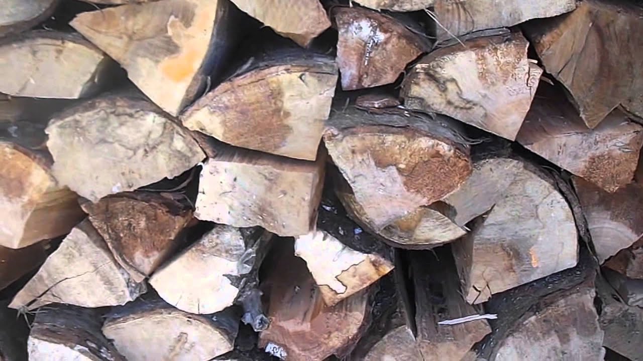 Stacking a Wood Pile - YouTube