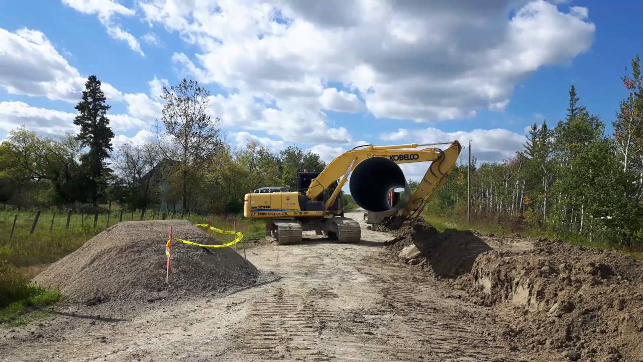 Installing large culverts. - YouTube
