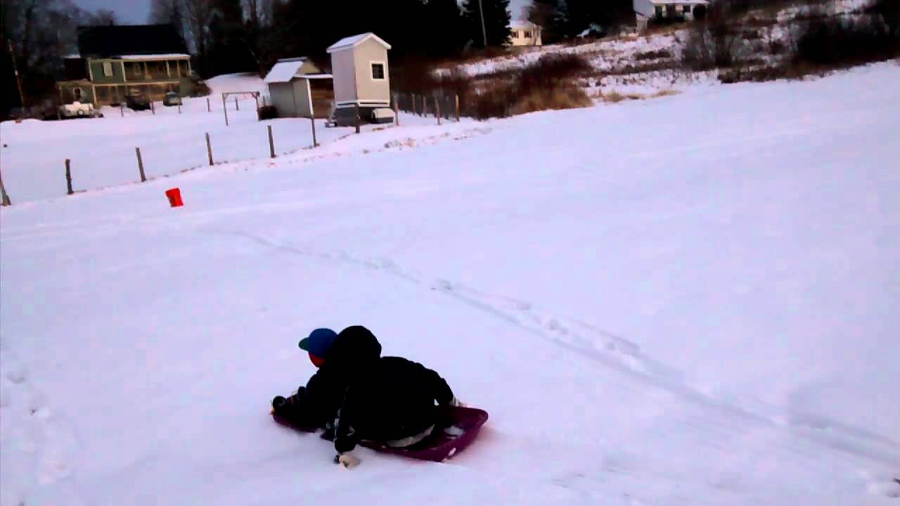 Backyard sledding - YouTube