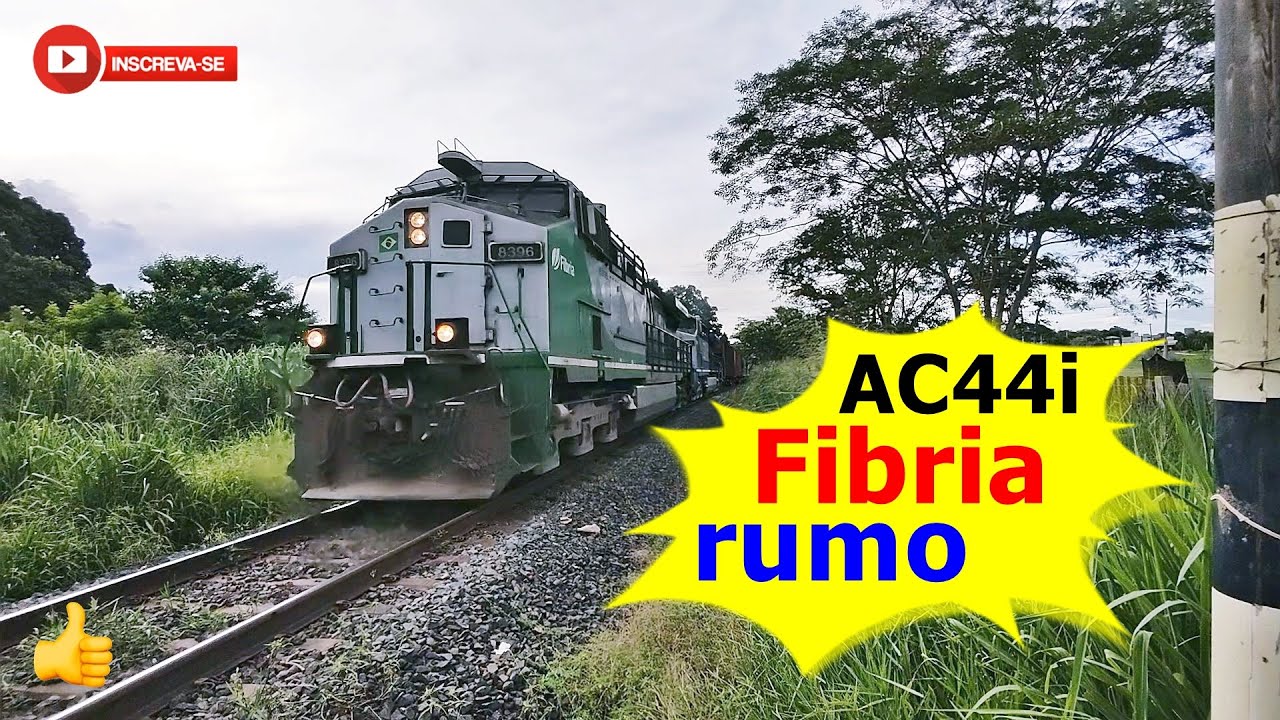 Trem de carga com locomotivas AC44i Fibria e rumo #8396, #2525 e #2514 ...