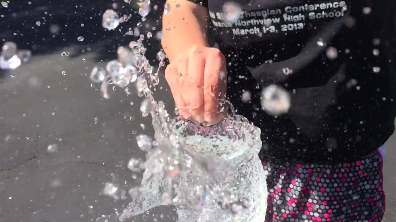 The Physics Behind Popping A Water Balloon - YouTube