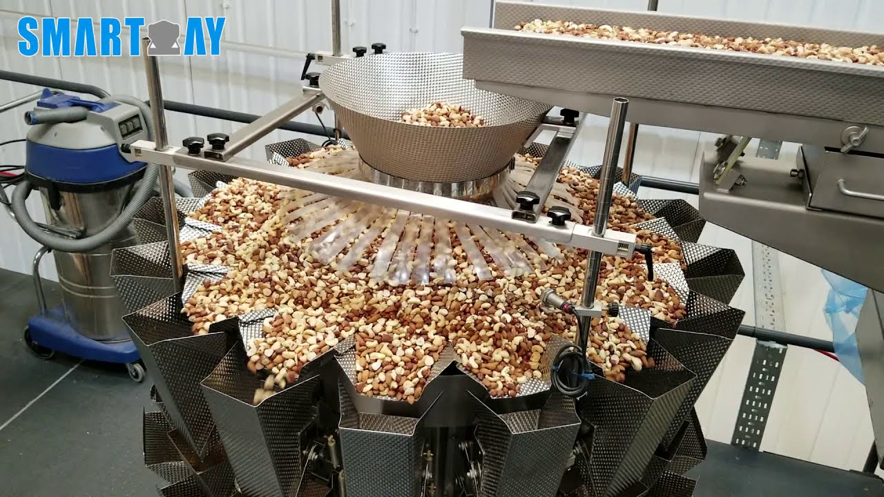 Nuts mix plastic cup filling sealing line - YouTube
