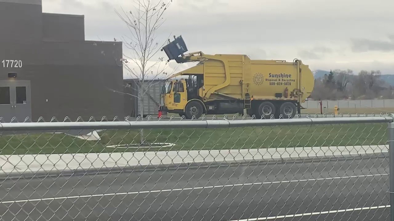 Old Sunshine Disposal Autocar WXLL Collecting trash at an elementary ...