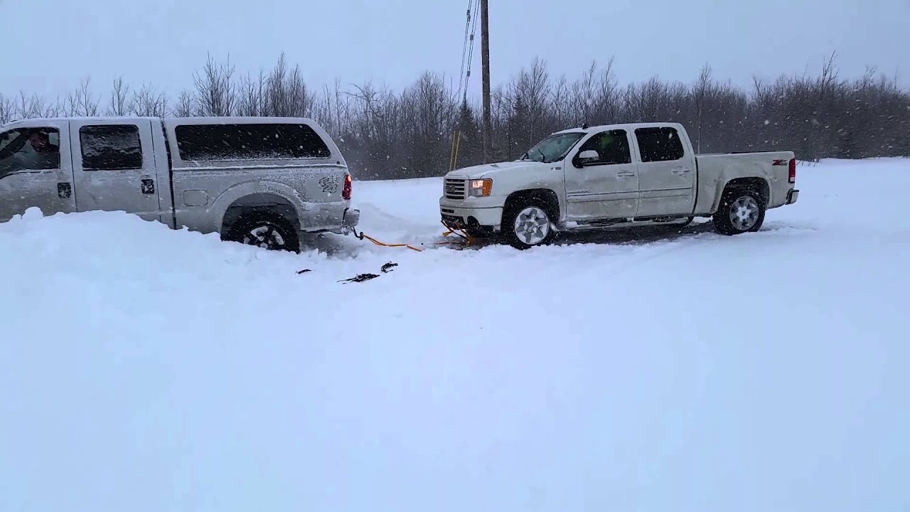 Gmc denali 1500 pulls out ford f250 - YouTube