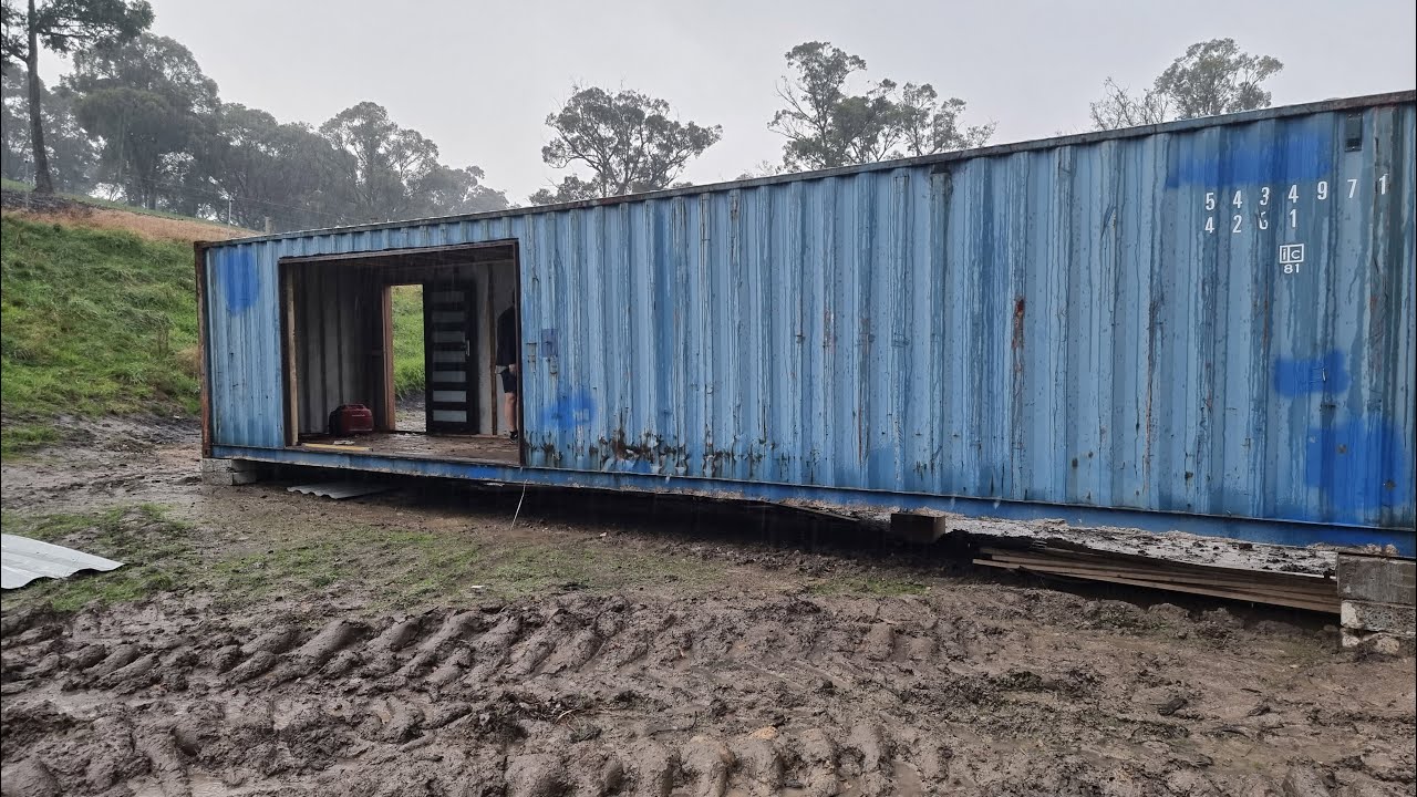 Installing a Sliding Door in our Container Home - YouTube