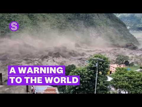 Nepal PM says floods ‘a warning to the world’ about climate change | Stuff.co.nz