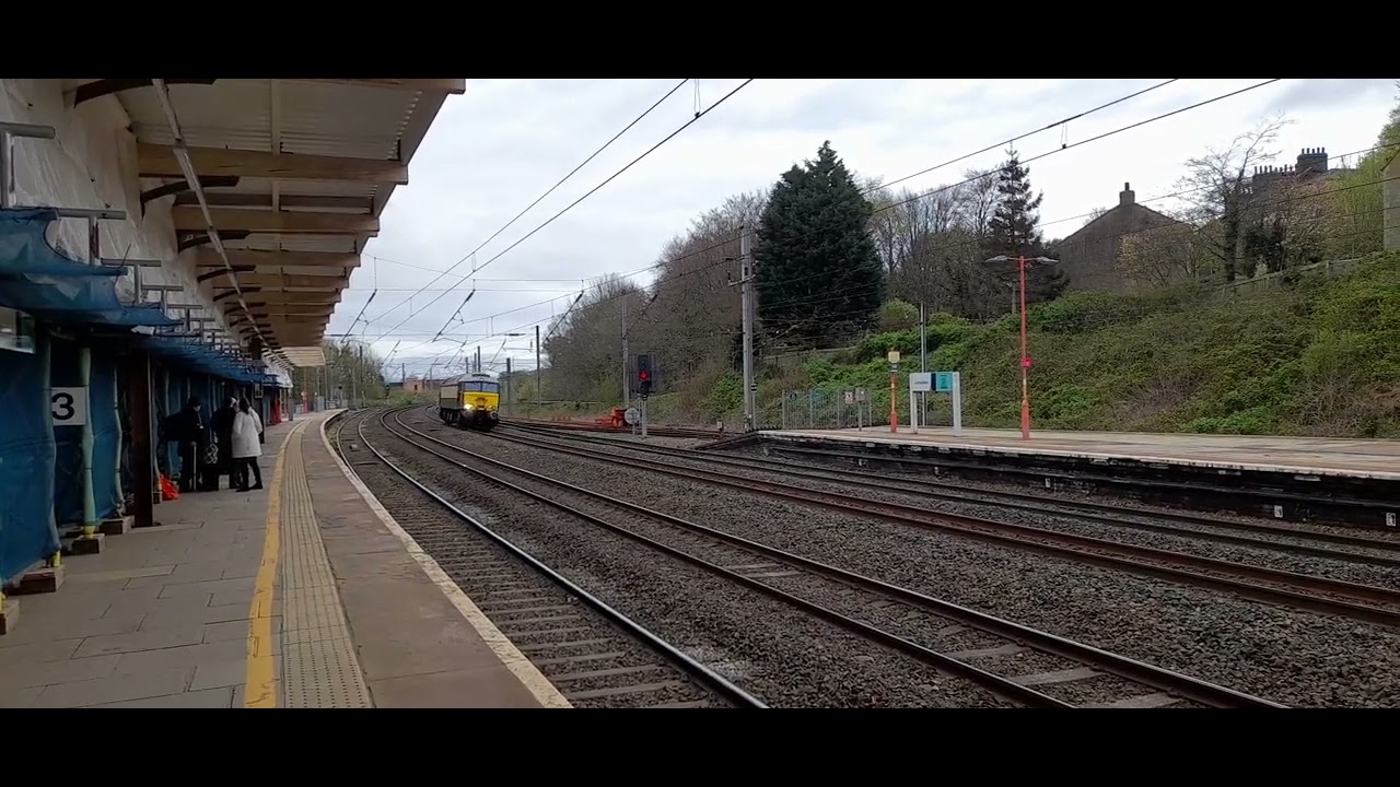 Northern Belle livery locomotive heads south through Lancaster Castle ...