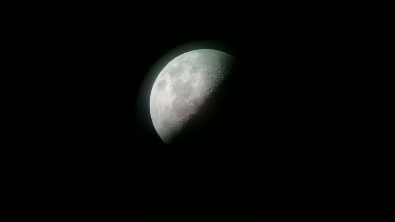 The moon under my telescope - YouTube
