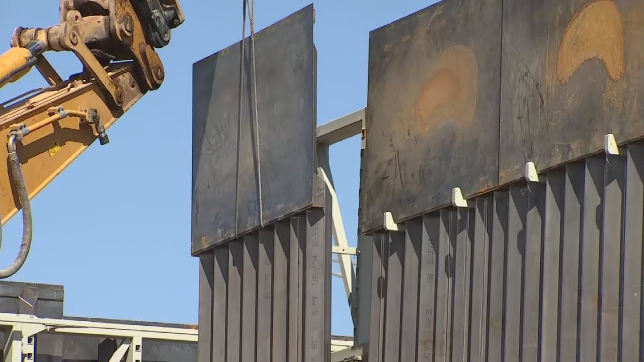 Tempe contractor demonstrates building technique for border wall - YouTube