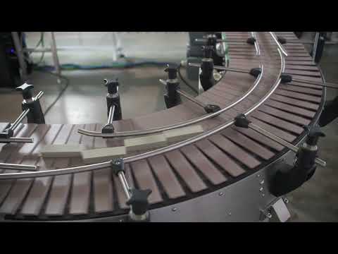 Kawasaki Robotics RS007L in packaging application with ELAU PacDrive servo systems
