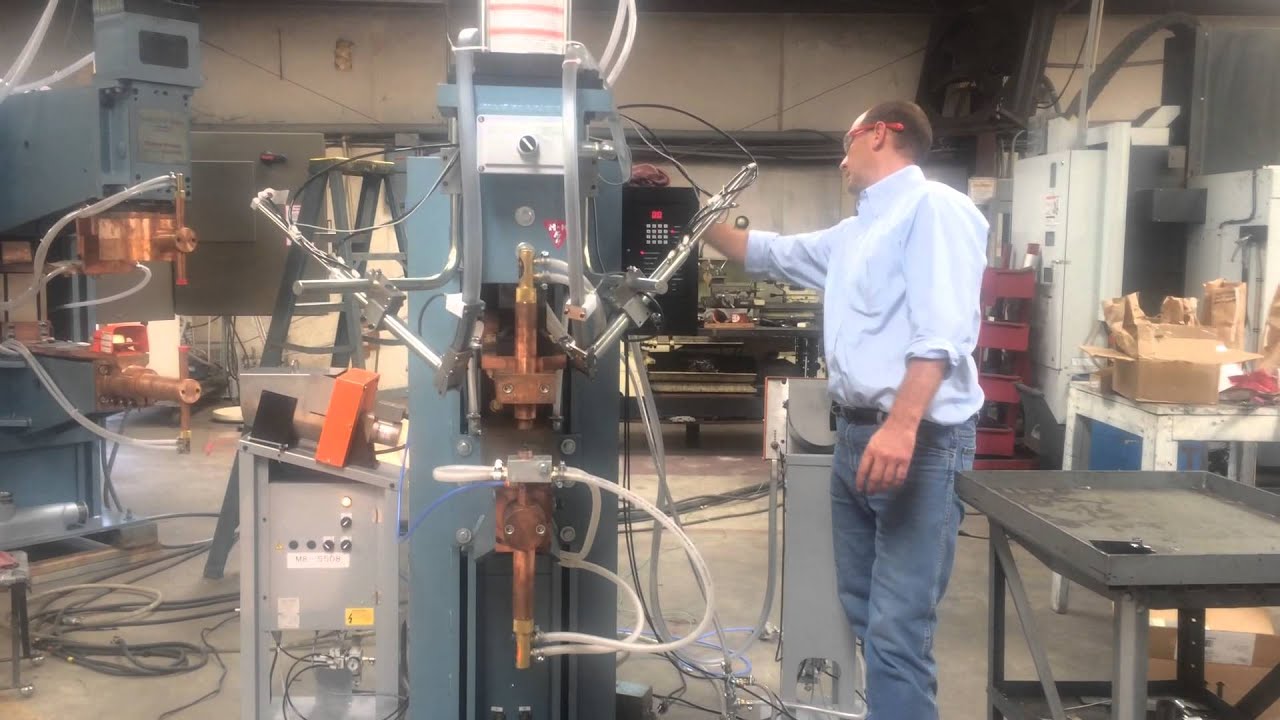 Nut welding with a Seki auto feed system - YouTube