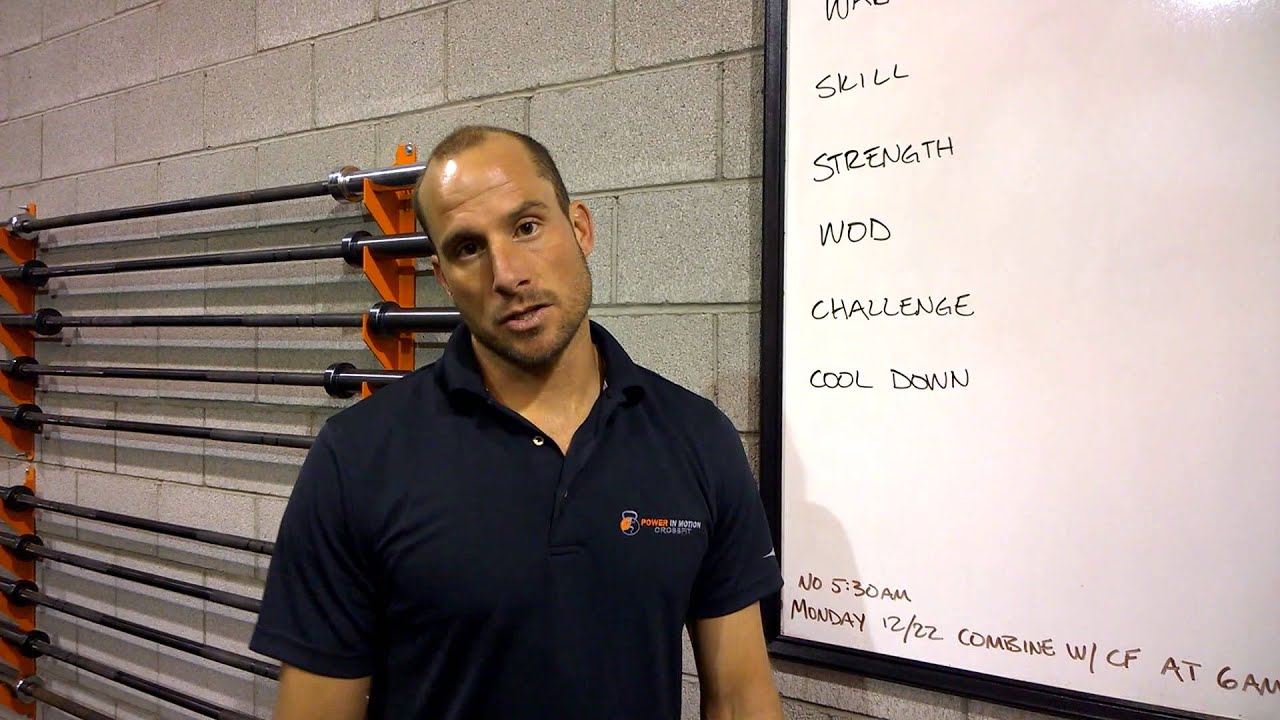 Coach Nick Goodman explaining programming at Power In Motion Institute ...