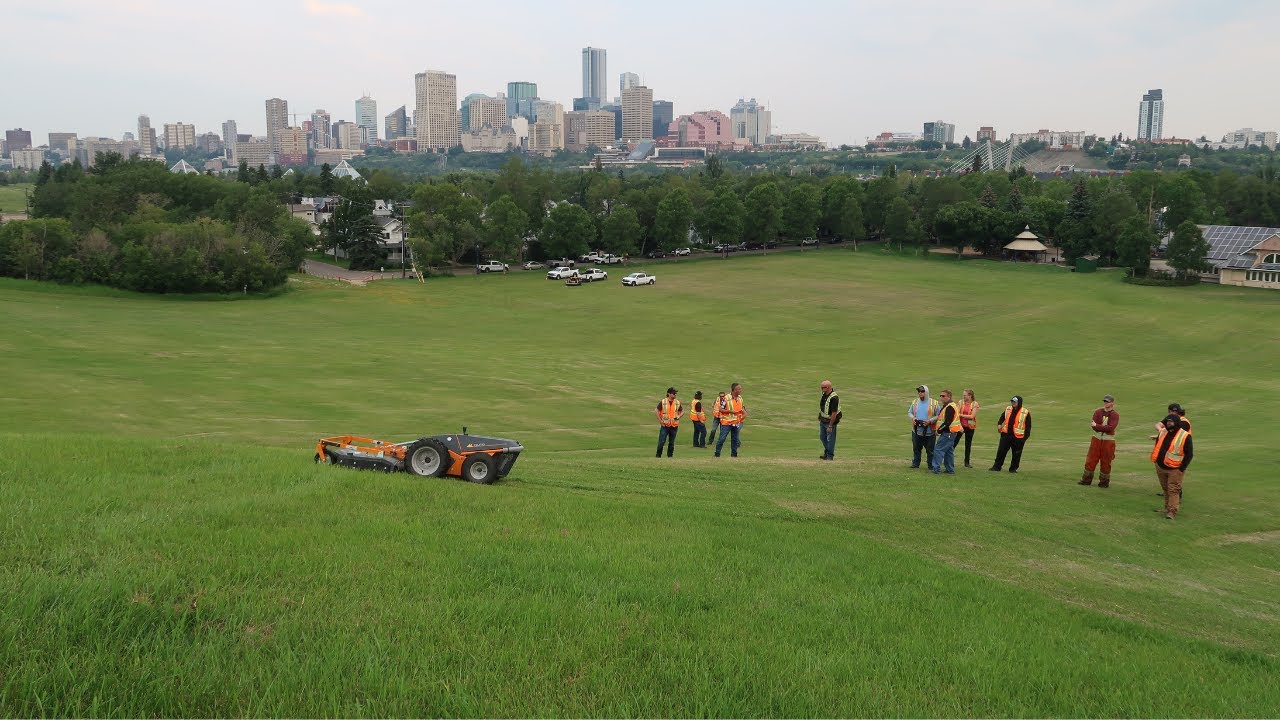 Raymo Electric Steep Slope Mower Demo - YouTube
