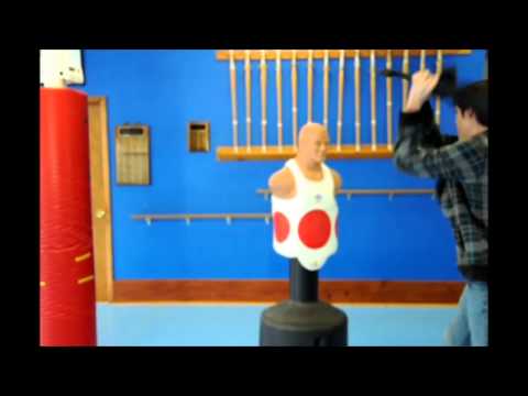 Mike hitting dummy with the Indestructible Umbrella - YouTube
