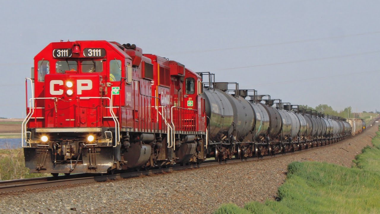 Speedy! CP small local freight train approaching Shepard on the Brooks ...