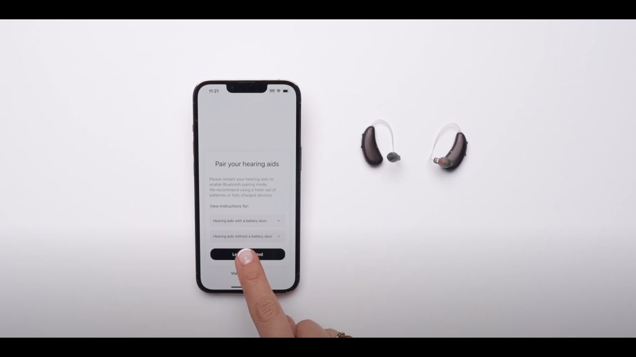 Het koppelen van oplaadbare hoortoestellen aan de Unitron Remote Plus ...