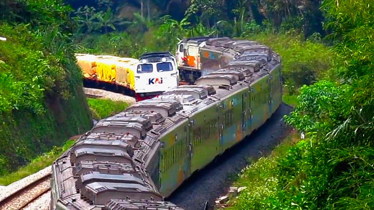 Two Trains Passing on the Track. - YouTube