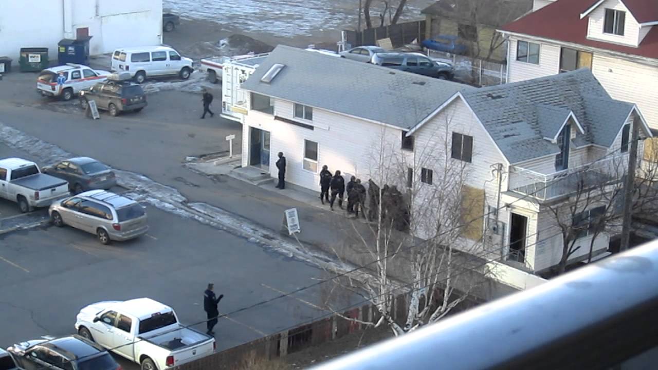 SWAT Team Setting Off Flash Bangs Across The Street - YouTube