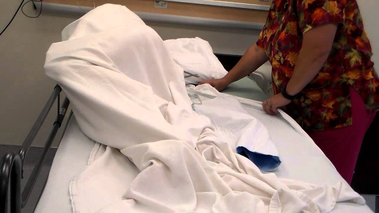 Skill 2.2 Changing an occupied bed - YouTube