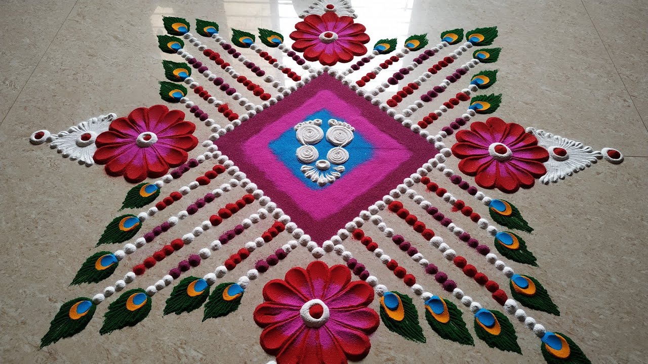 Beautiful & Big Mahalaxmi Charan Peacock Feather Rangoli Design ...